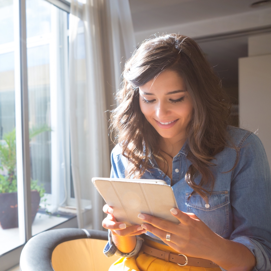 Lady with iPad - Square - Switch Media