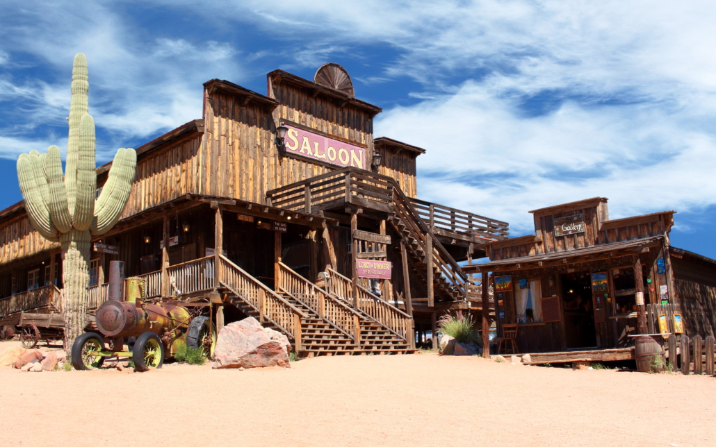 Old Wild West desert cowboy town with cactus and saloon - Switch Media